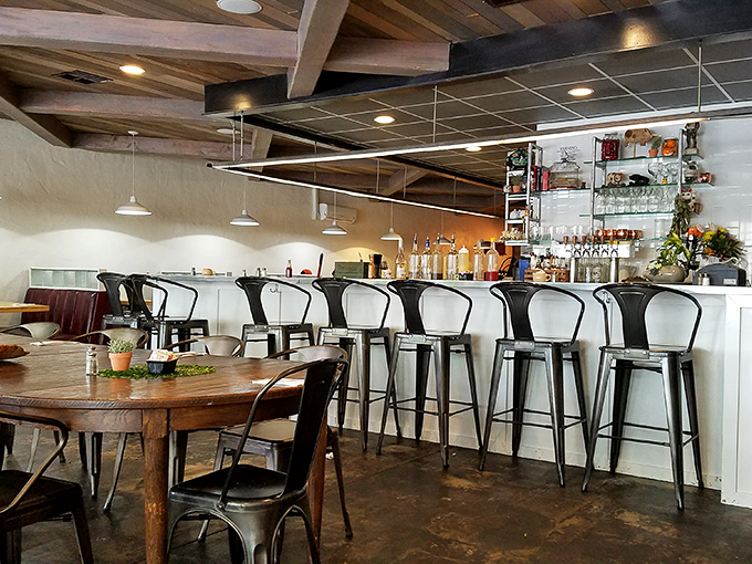 Industrial meets farmhouse in this thoughtfully designed space. Those wooden ceiling beams have witnessed countless breakfast epiphanies and spontaneous "mmm" sounds.