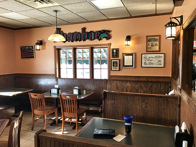 Wood paneling and cozy booths create that perfect "time stood still" atmosphere where memories are made between bites of comfort food.