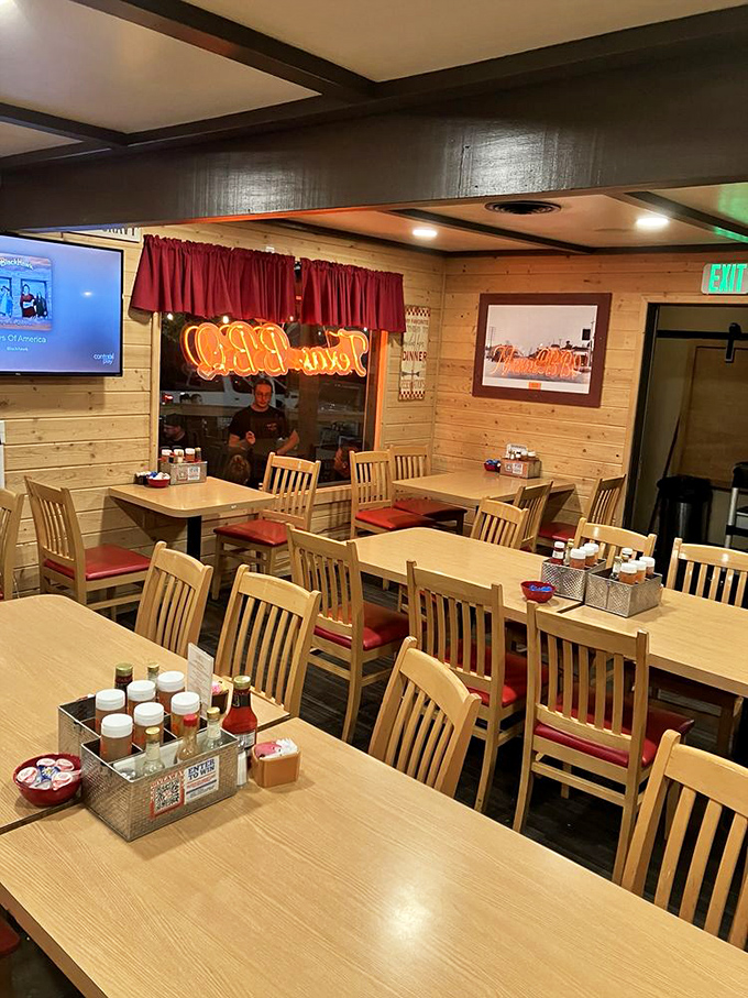 Inside, wood-paneled walls and cozy seating create that "everybody knows your name" vibe that chain restaurants spend millions trying to fake.