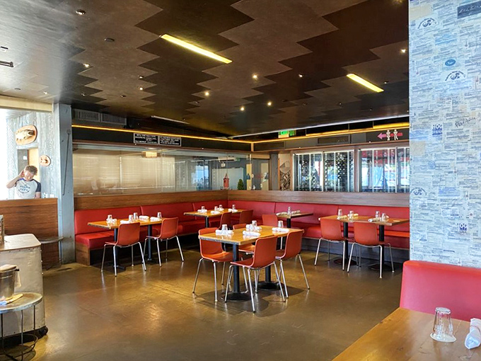 Red vinyl booths and industrial chic vibes create the perfect backdrop for seafood indulgence&mdash;like a maritime dream with better lighting.