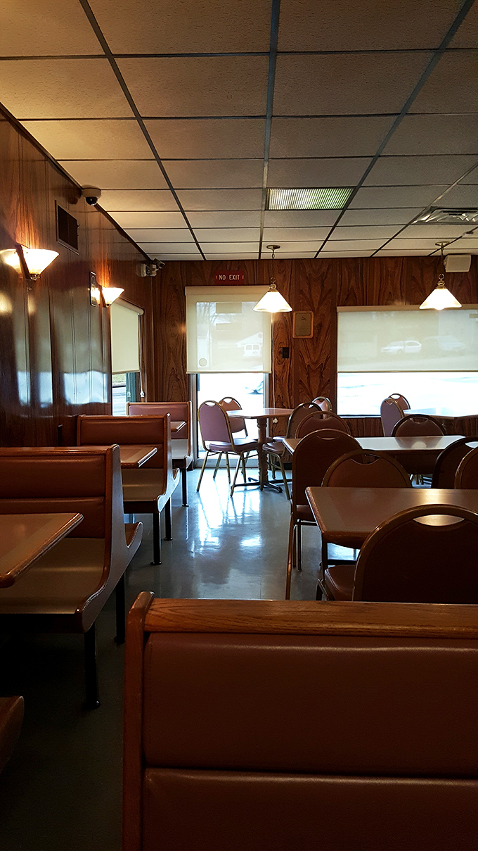 Step inside and time travel back to the golden age of pizzerias&mdash;wood paneling, vinyl booths, and not an Edison bulb in sight.