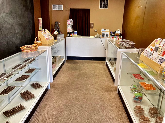 Step inside and prepare for sensory overload – glass cases filled with handcrafted treasures that would make Willy Wonka himself jealous.