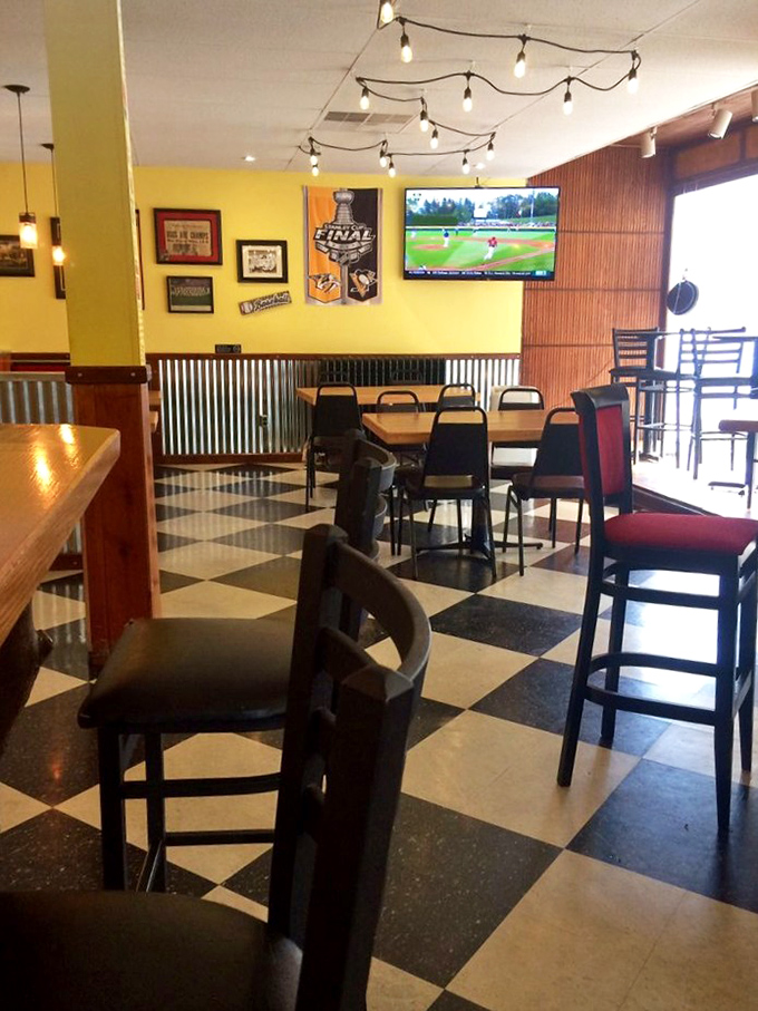 Yellow walls, checkered floors, and string lights create that "come as you are" vibe where memorable meals happen and diets go to die.