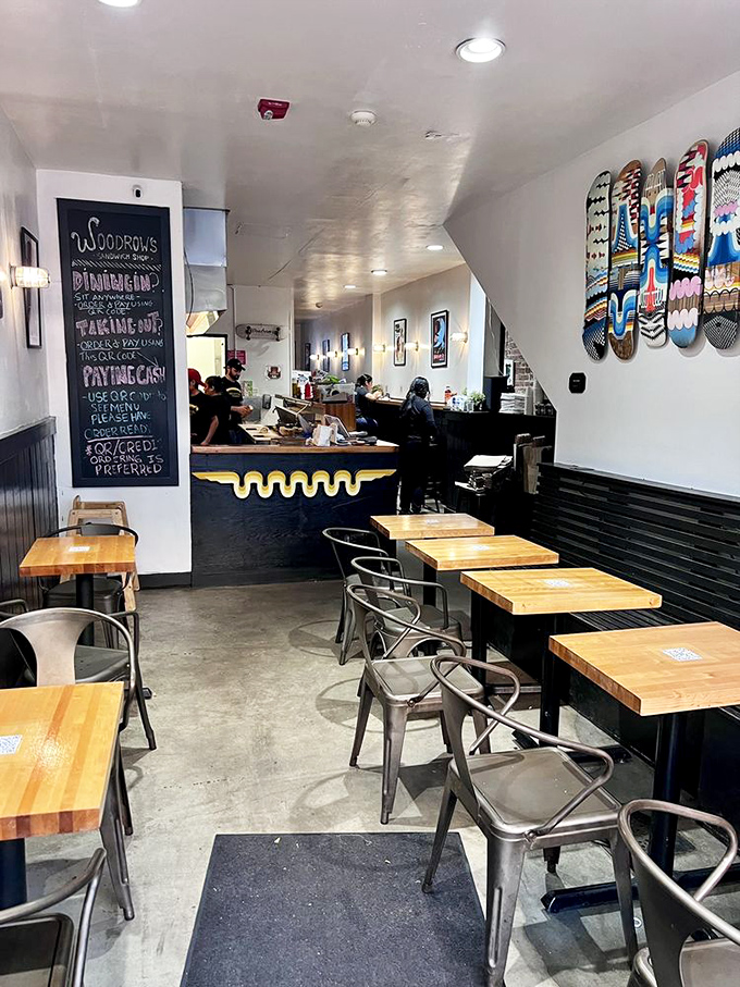 Industrial chic meets sandwich artistry in this compact temple to flavor. Those skateboard decks aren't just decoration—they're a promise of adventure.