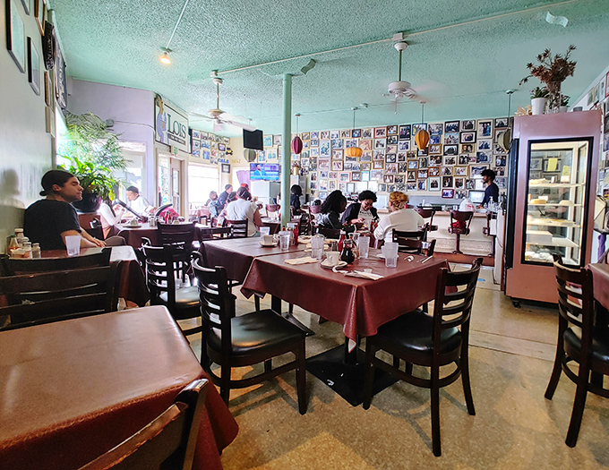 Inside, hundreds of photos line the walls &ndash; a visual history book of community connections that's as rich as the food they serve.