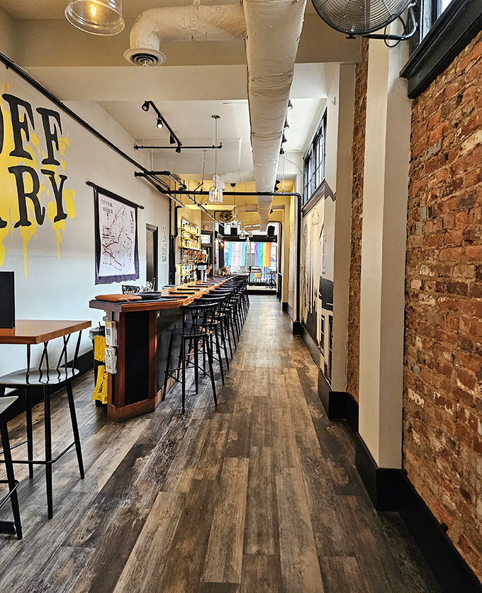The narrow, wood-floored interior feels like a culinary runway where burger dreams come true. Those exposed brick walls have witnessed countless "first bite" moments.