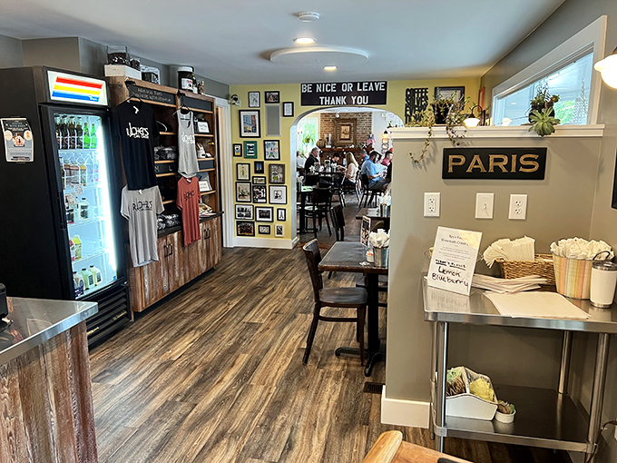 Inside, wooden floors and eclectic decor create a space that's both cozy and Instagram-worthy. The "Be Nice or Leave" sign isn't just decoration&mdash;it's a life philosophy.