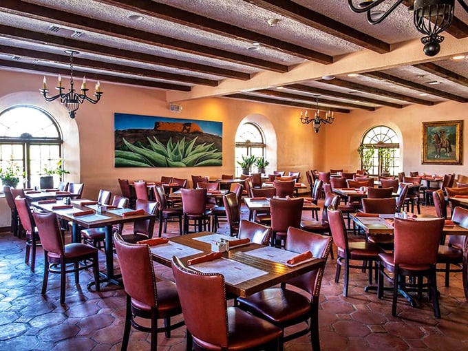 Warm terracotta floors, exposed beams, and southwestern art create that perfect "I've arrived somewhere special" feeling the moment you step inside.