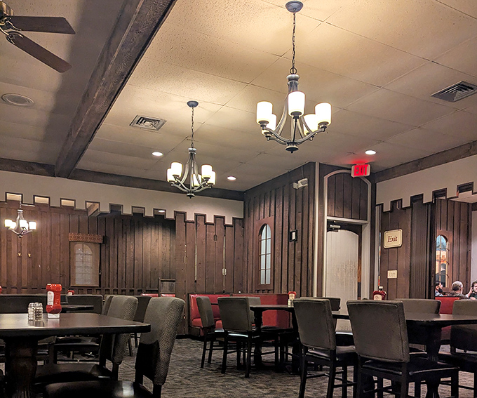 Step inside and you're transported to the 1970s&mdash;dark wood paneling, castle-inspired details, and chandeliers that say "we're fancy, but not too fancy."