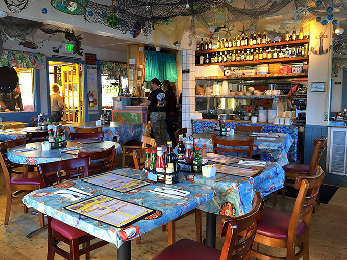 Inside, fishing nets and maritime charm create the perfect backdrop for serious seafood enjoyment&mdash;no interior designer needed, just decades of authentic coastal character.