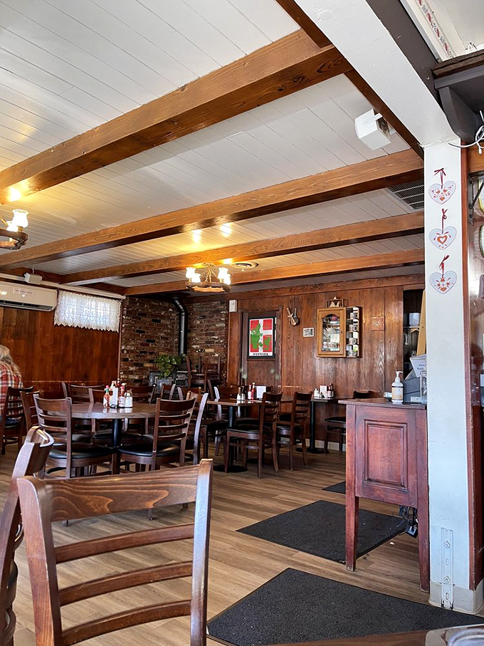 Exposed wooden beams and warm paneling create that rare dining atmosphere that's both cozy and spacious&mdash;like dining in a particularly delicious ski lodge.