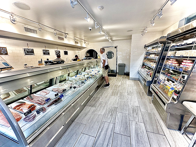 Pristine display cases showcase the day's catch in all its glistening glory. The bright, clean interior is seafood shopping as it should be.