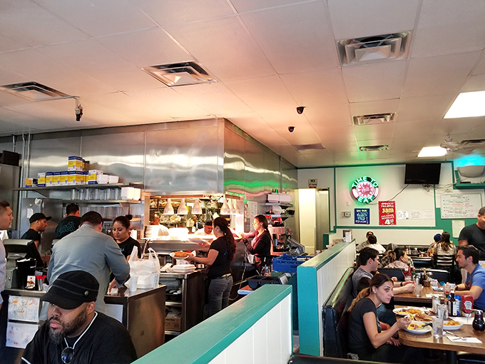 Where breakfast dreams are assembled in real time. The symphony of sizzling and chatter creates the perfect morning soundtrack that Spotify could never duplicate.