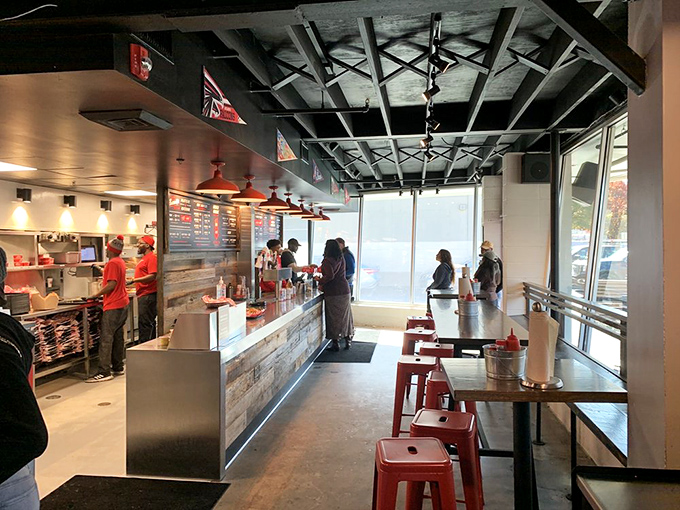 Industrial-chic meets Southern hospitality in this bright, airy space. The exposed ceiling says "trendy," but those red stools say "sit down and stay awhile."