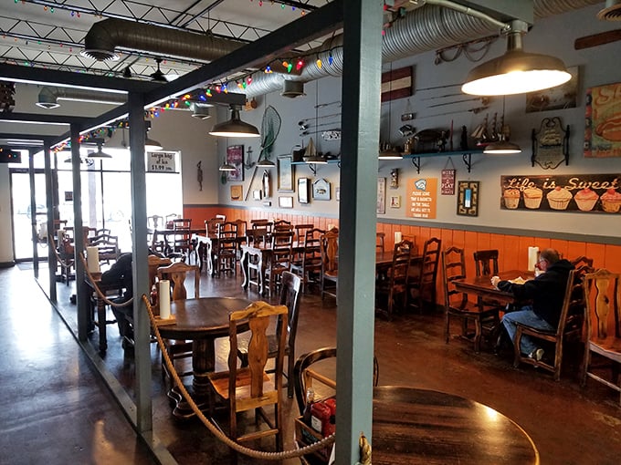 Inside, mismatched wooden chairs and nautical decor create that rare atmosphere where comfort trumps pretension, and the focus stays squarely on what matters: the food.