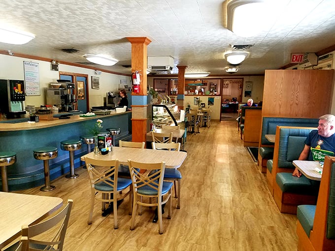 Inside, time slows down as wood-paneled warmth and comfortable booths create the perfect backdrop for conversations that matter and breakfasts that satisfy.