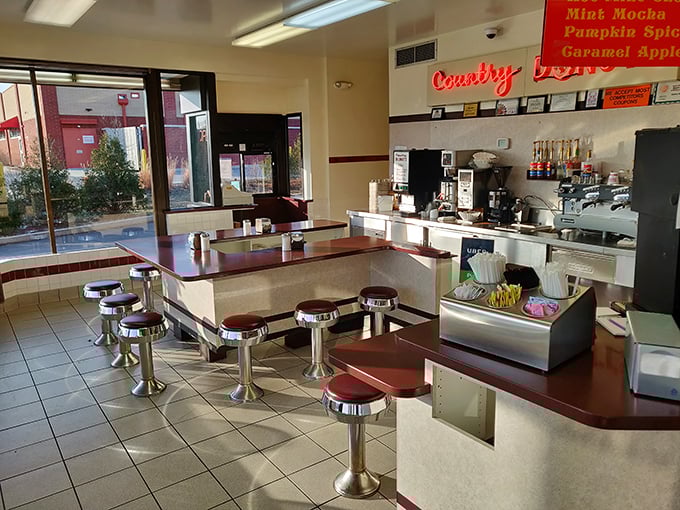 Step inside this retro wonderland where chrome stools and tile floors whisper tales of simpler times.