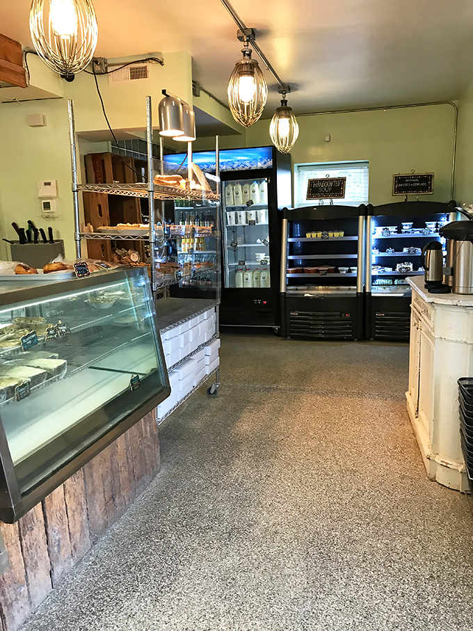 Industrial mixer whisks transformed into light fixtures—because when you're this serious about baking, even your décor celebrates the craft.