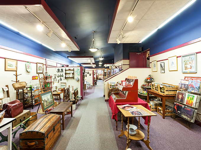 Blue walls and red trim create the perfect backdrop for this carefully curated wonderland of vintage treasures and collectibles.