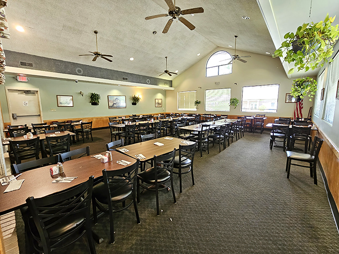 High ceilings, natural light, and tables arranged for conversation &ndash; this dining room feels like the community living room everyone wishes they had.