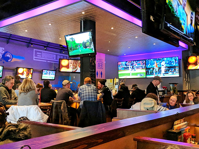 Where sports fans become family. The purple-blue lighting creates the perfect atmosphere for cheering your team while demolishing a plate of wings.