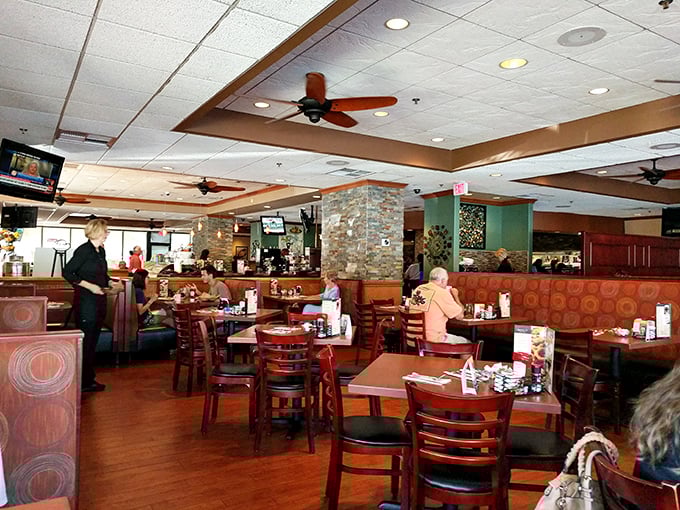 Inside, warm wood tones and comfortable seating create that perfect diner atmosphere&mdash;where breakfast decisions become life's most important choices.