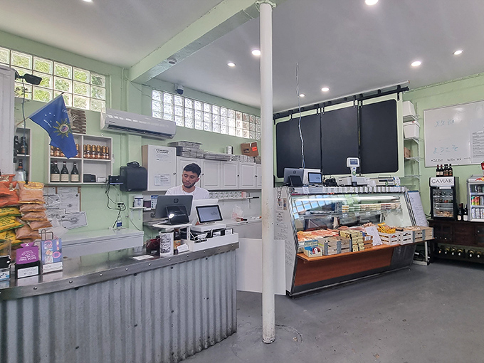 Inside, the mint-green walls and no-nonsense counter create a refreshingly unpretentious atmosphere. This is a temple of seafood, not selfies.