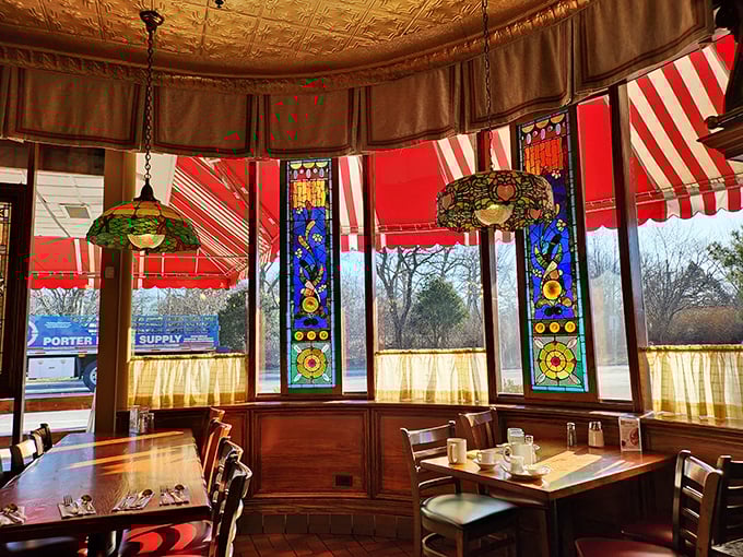 Stained glass windows filter morning light into a kaleidoscope of colors, turning everyday breakfast into a near-religious experience.