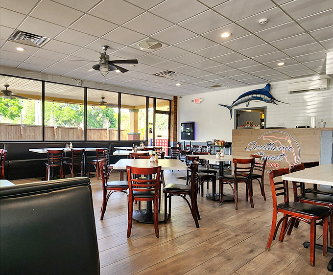 Clean lines, wooden accents, and that marlin watching over diners like the guardian of good taste it is.