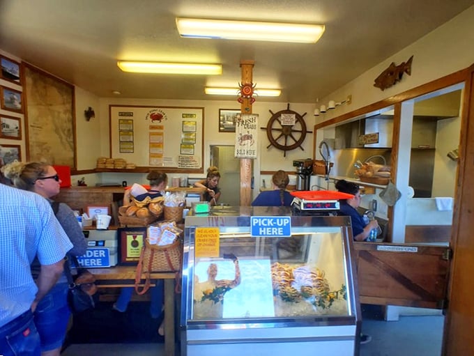 Industrial meets cozy in this thoughtfully designed space where wooden tables, metal chairs, and that weathered floor say, "Stay awhile, the food's worth it."