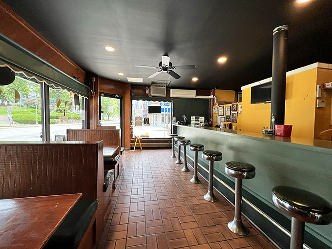 Where counter culture meets comfort food – Roxy's interior welcomes with its no-nonsense stools, brick floors, and promise of honest eating.