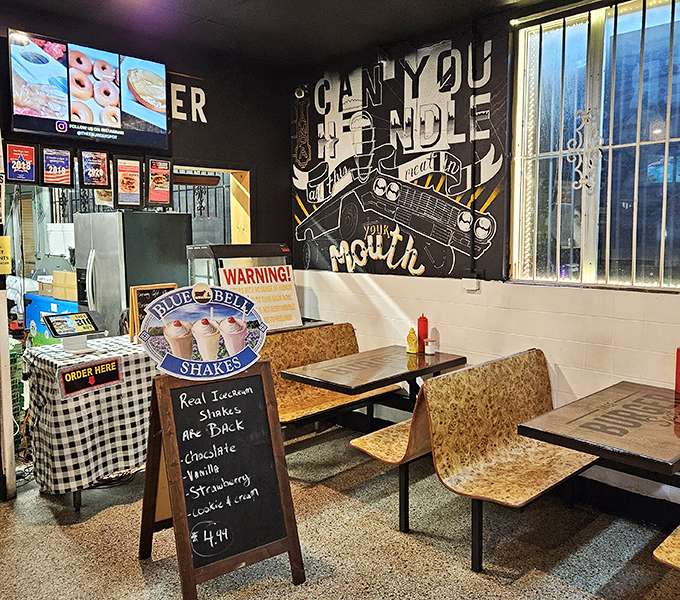 Inside, the playful wall art asks life's most important question: "Can You Handle All This Meat In Your Mouth?" Spoiler alert: you'll certainly want to try.