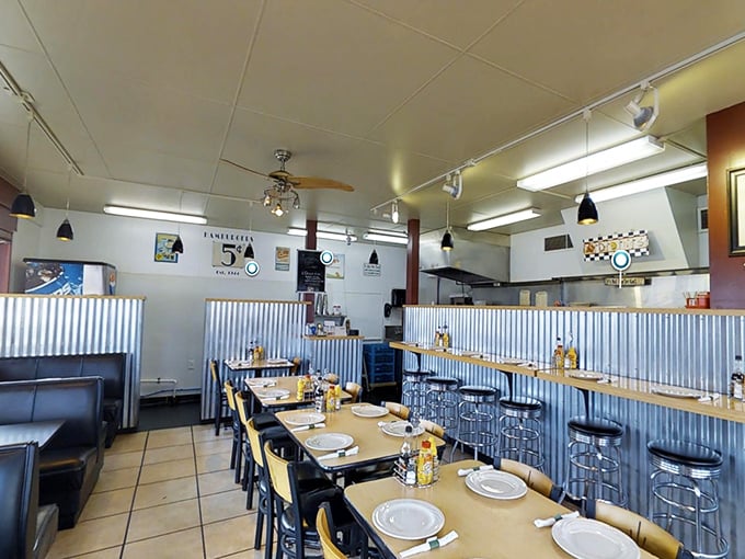 Classic Americana comes alive with corrugated metal wainscoting and counter seating that invites you to settle in for comfort food perfection.