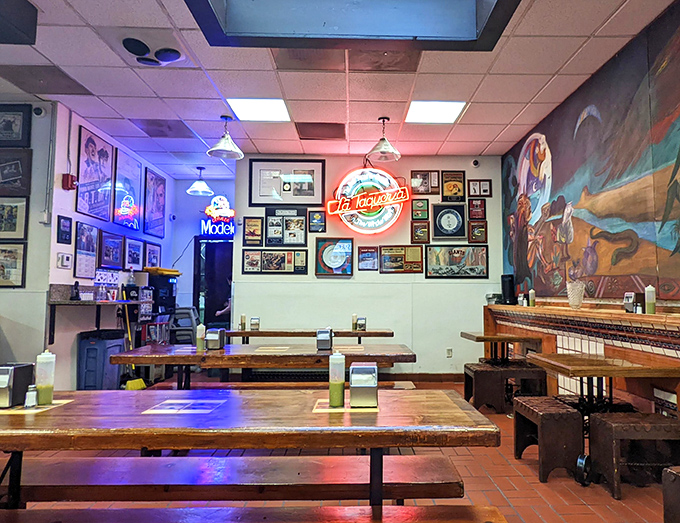 Inside, walls adorned with decades of accolades tell the story of culinary excellence, while wooden tables await the next generation of burrito believers.
