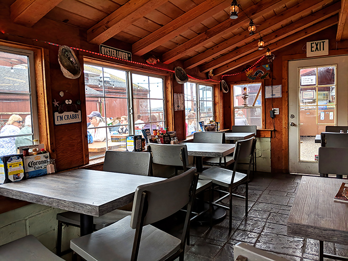 Inside, wooden beams and nautical touches create the perfect no-frills backdrop for serious seafood enjoyment. That "I'M CRABBY" sign speaks to me before coffee.