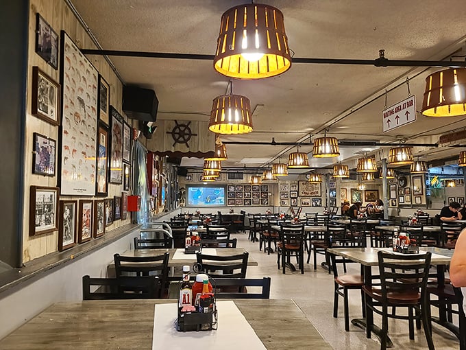 Decades of memories line these walls, where wooden basket lights cast the perfect glow for seafood feasts and shell-cracking symphonies.