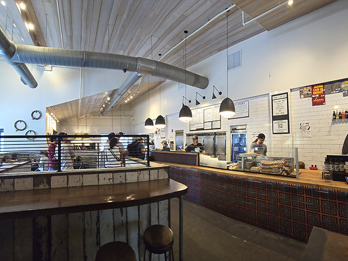 Industrial chic meets Southern comfort in this airy interior where the ceiling soars almost as high as your expectations for what's about to hit your plate.