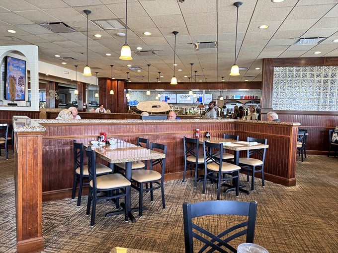 Inside, the warm wood paneling and comfortable booths transport you straight to the heart of a classic New York delicatessen.