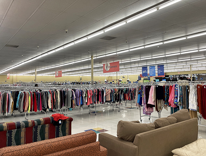 Endless racks stretch toward retail infinity, a kaleidoscope of secondhand fashion waiting for its second chance at stylish life.