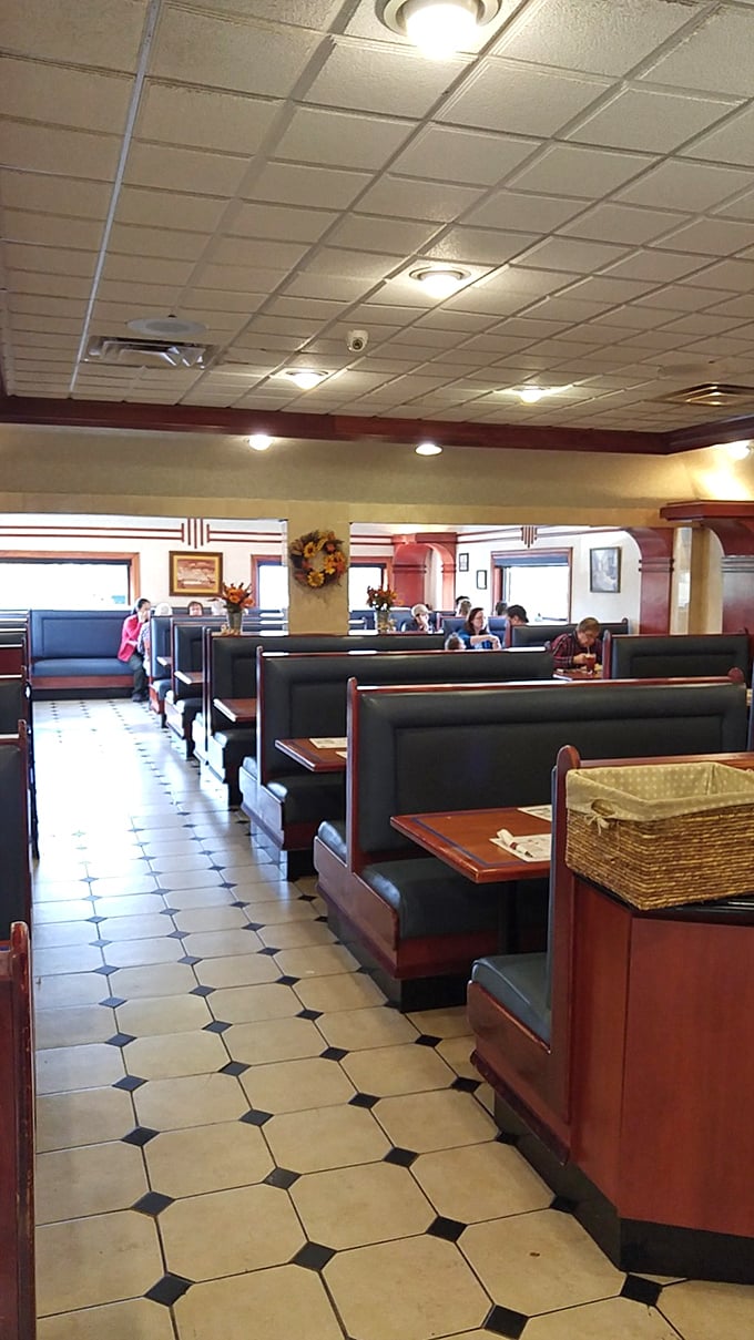 Rustic wooden beams meet elegant macram&eacute; chandeliers in this delightfully eclectic dining room where mismatched chairs somehow create perfect harmony.