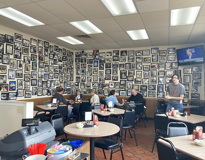 Wall-to-wall memories line this diner where every photograph tells a story. It's like eating breakfast inside a community scrapbook.