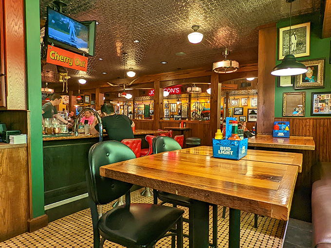 Step inside to discover warm wood tones, pressed tin ceilings, and an atmosphere that feels like a hug from your favorite aunt.