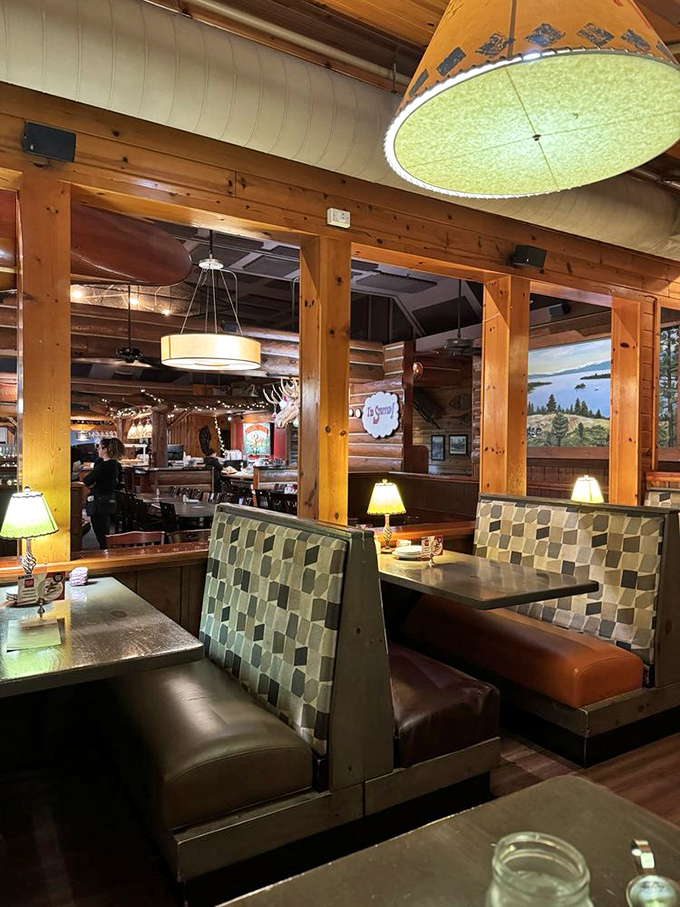 Inside Tahoe Joe's, rustic wooden beams and warm lighting create that "just hiked all day and found paradise" feeling. The booths practically whisper, "Stay awhile, your diet starts tomorrow."