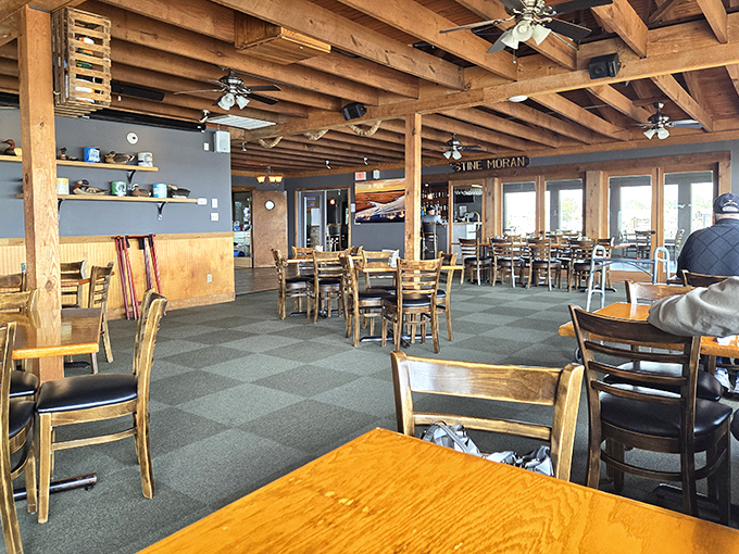 Inside, a fruit wonderland awaits. Wooden bins overflow with exotic varieties while colorful signs guide you through this produce paradise.