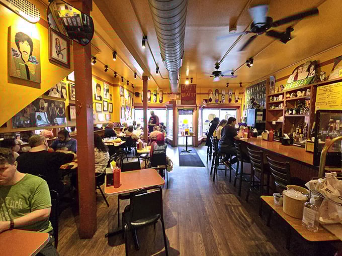 The cozy interior feels like a hot dog speakeasy where wiener enthusiasts gather to worship at the altar of creative toppings and good vibes.