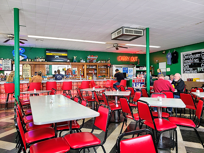 Red chairs and green walls create a diner symphony that's been playing since 1918. No reservations, no pretension, just honest-to-goodness Indiana hospitality.