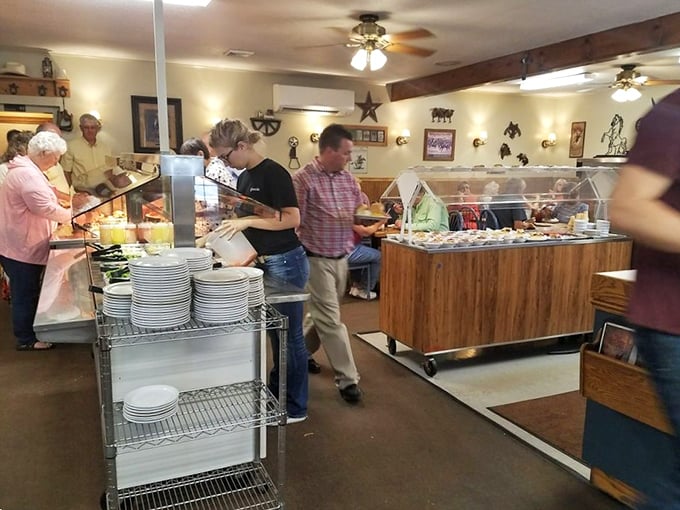 Inside, the buffet spreads like a golden promise of comfort food dreams come true.