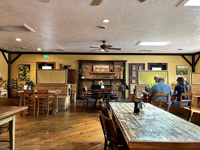 Where rustic meets refined. Weathered wooden beams frame warm yellow walls, while sturdy tables invite you to settle in for a meal worth remembering.