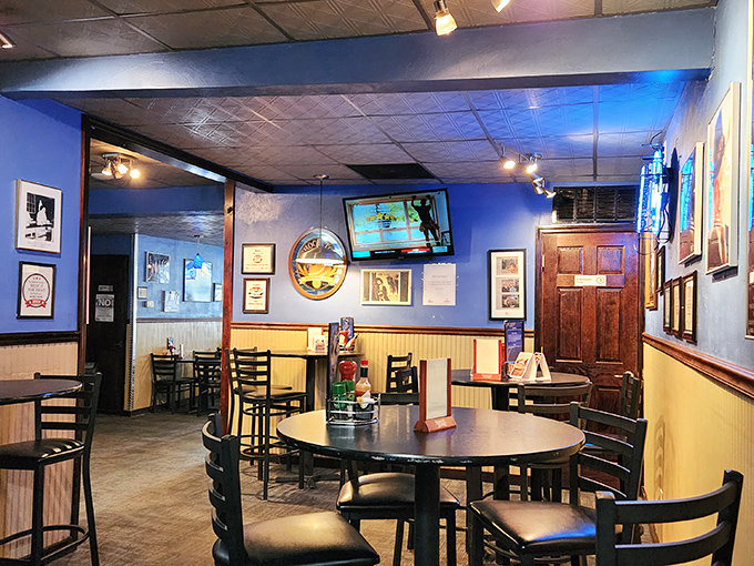 Blue walls, wooden wainscoting, and comfortable seating create that perfect "everybody knows your name" vibe that makes you want to linger.