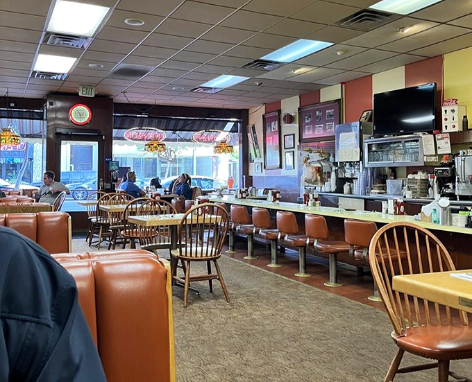Inside Ole's, time stands deliciously still. Wooden chairs, classic counter seating, and the gentle hum of morning conversations create the soundtrack of breakfast perfection.